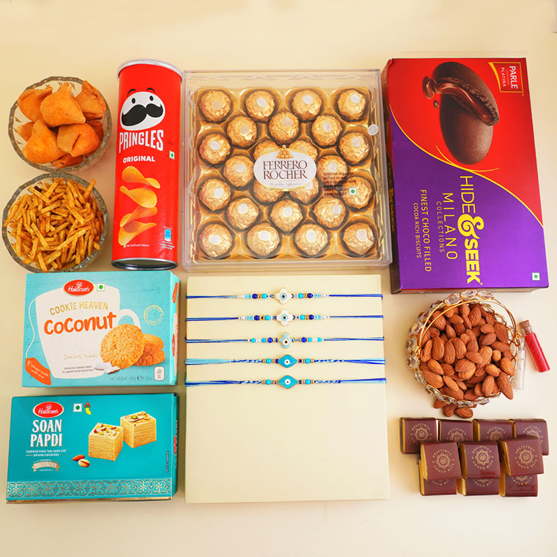 Send Five Evil Eye Rakhi Set with Sweets Gift Hamper Online